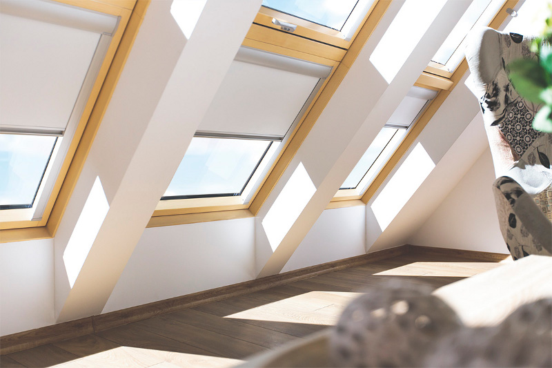 Innovative, large roof window in which the open sashes create a balcony ...