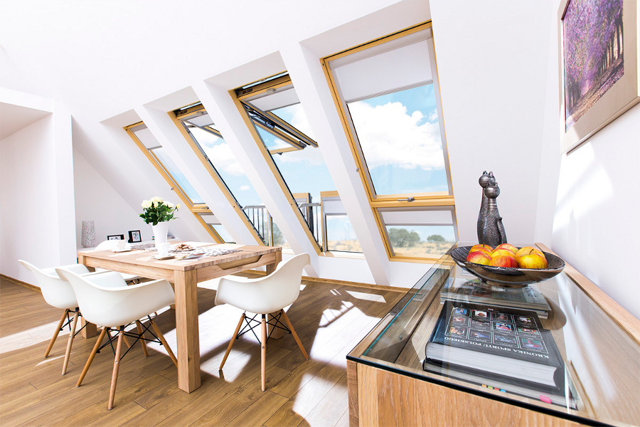 Innovative, large roof window in which the open sashes create a balcony ...
