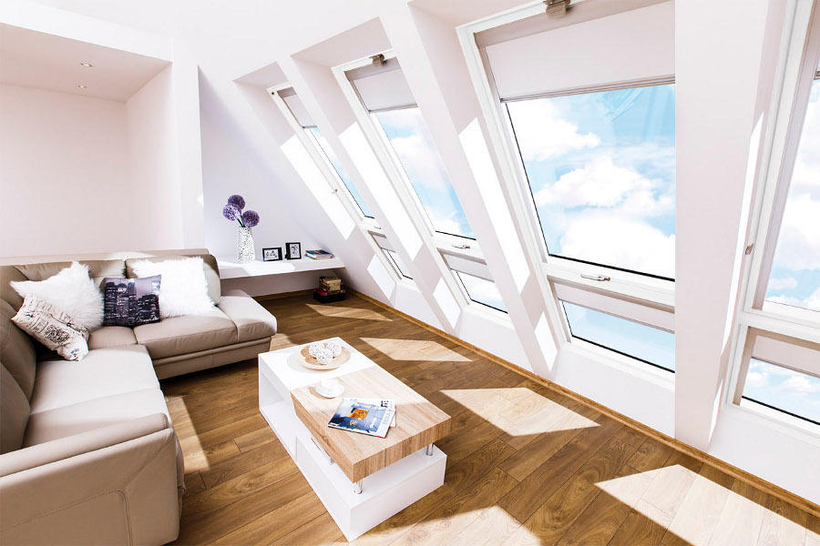 Innovative, large roof window in which the open sashes create a balcony ...