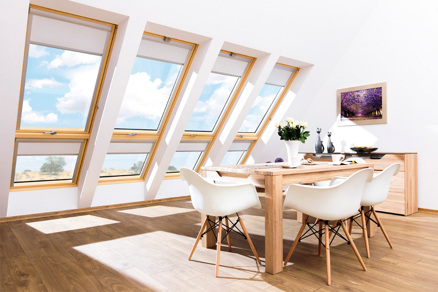 Innovative, large roof window in which the open sashes create a balcony ...