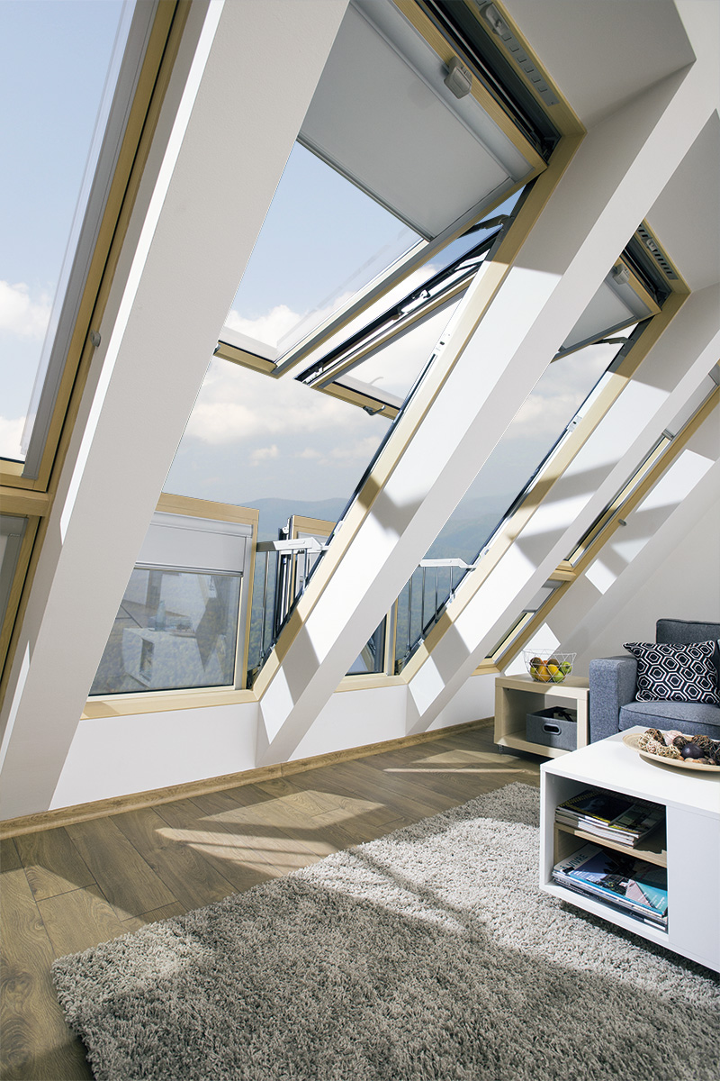 Innovative, large roof window in which the open sashes create a balcony ...