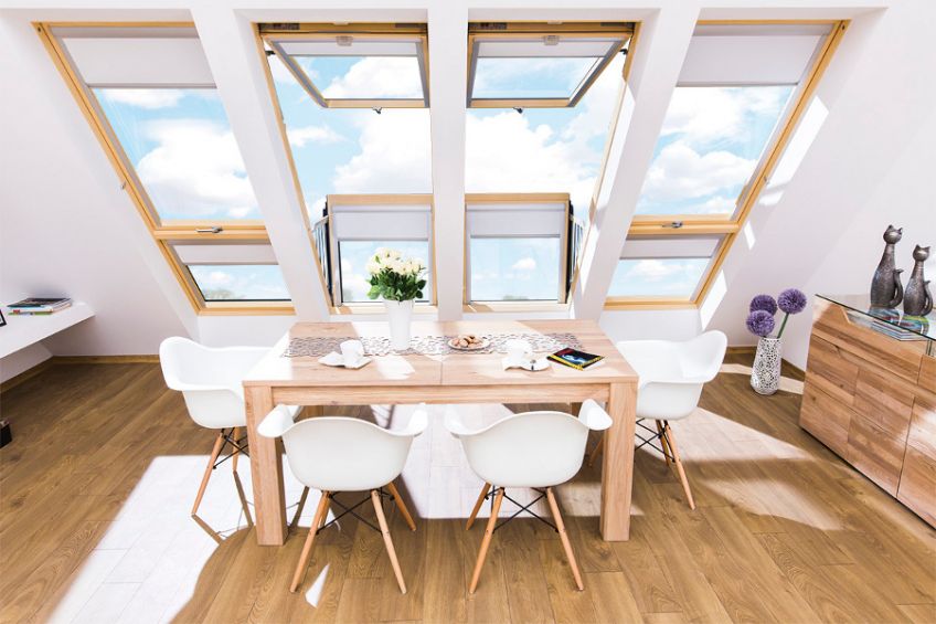 Innovative, large roof window in which the open sashes create a balcony ...