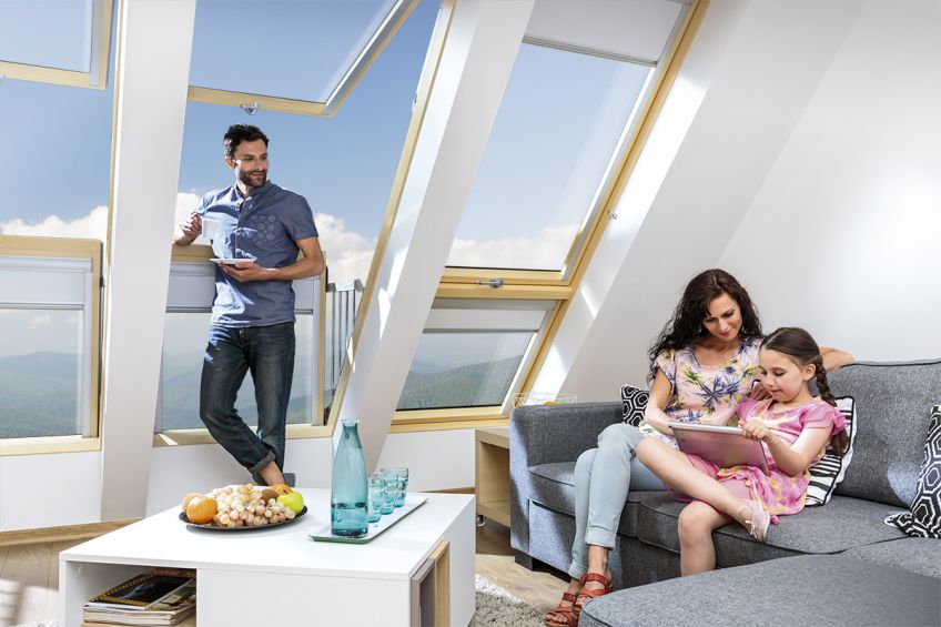 Innovative, large roof window in which the open sashes create a balcony ...